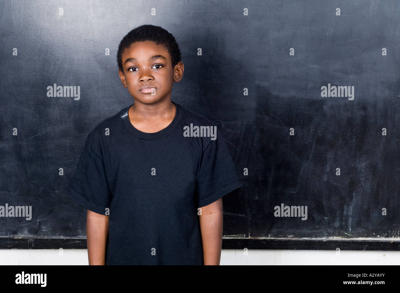 Sad student in a classroom Stock Photo - Alamy