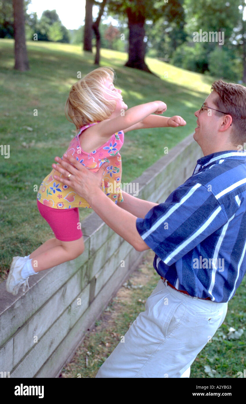 Daughter jumping into dads arms at Merriam Park age 32 and 4. St Paul ...