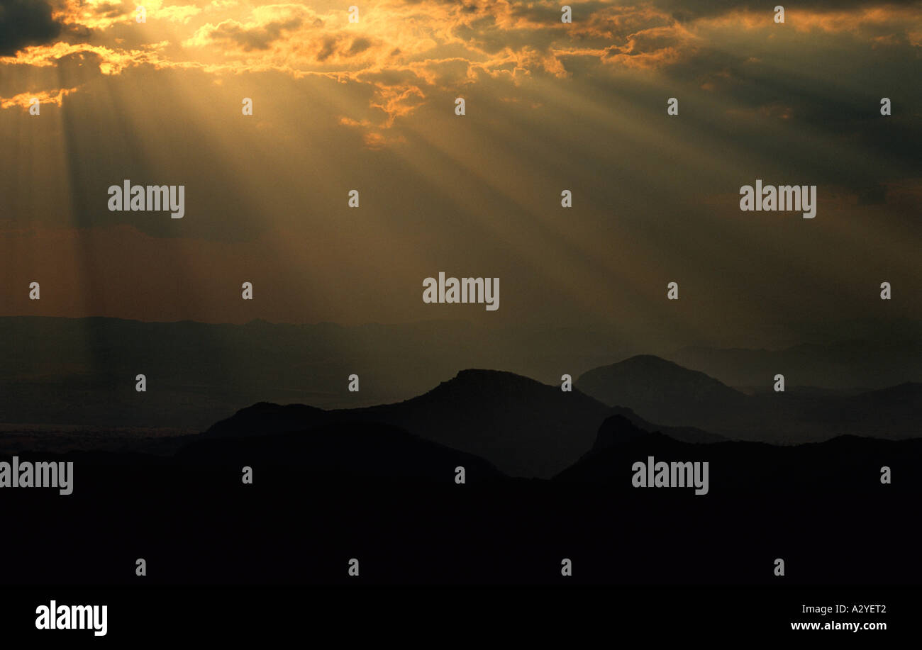 Shafts of sunlight breaking through the clouds Stock Photo - Alamy