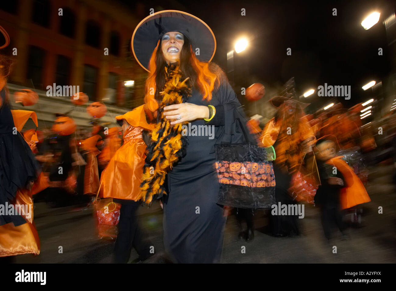 schoolchildren and teachers dressed as orange pumpkins parade down ...