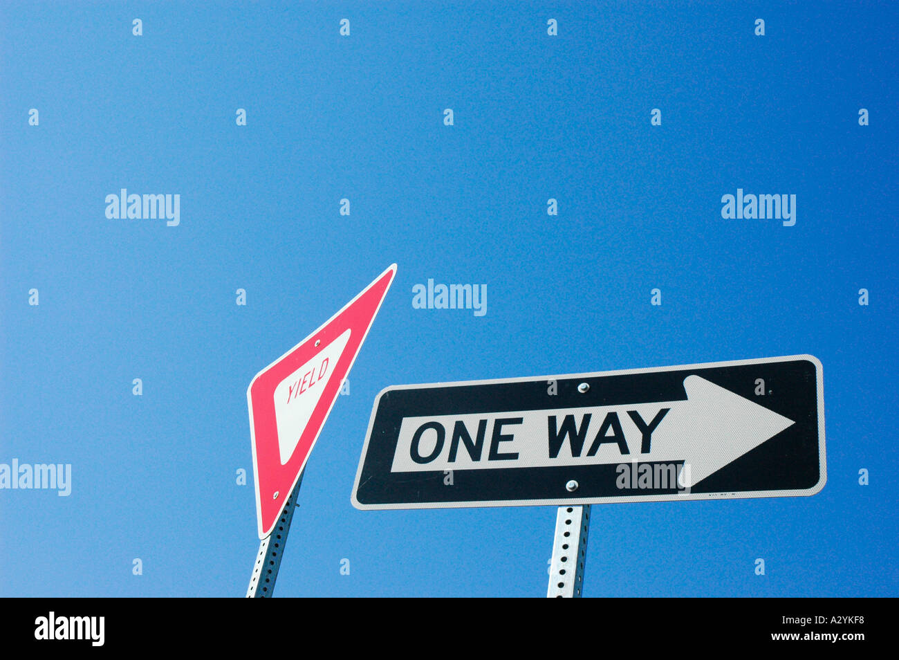 Yield and one way signs on freeway highway for drivers to see at ...