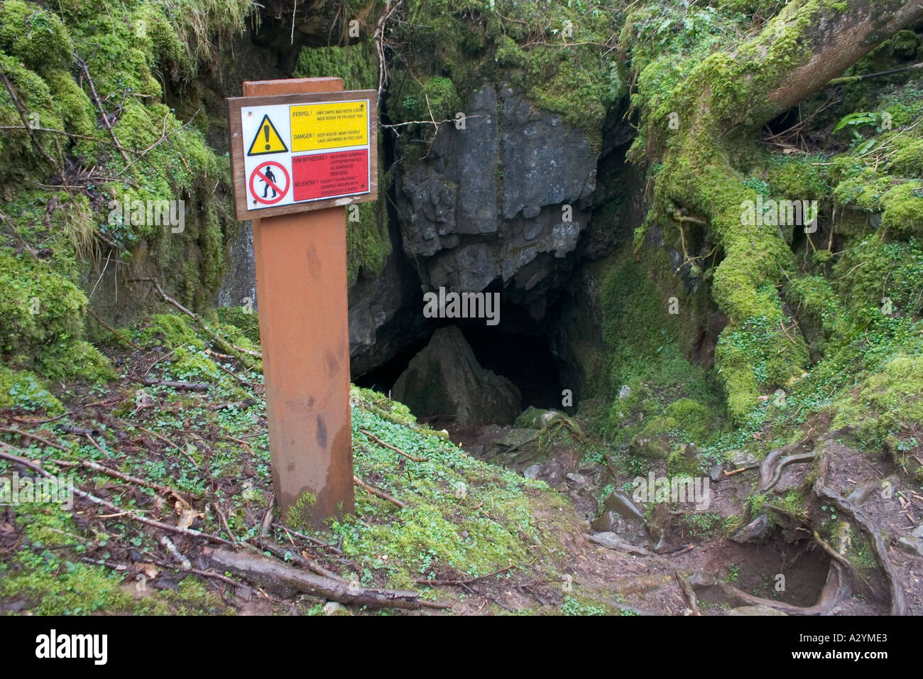Warning sign at entrance to cave Porth yr Ogof Brecon beacons national ...