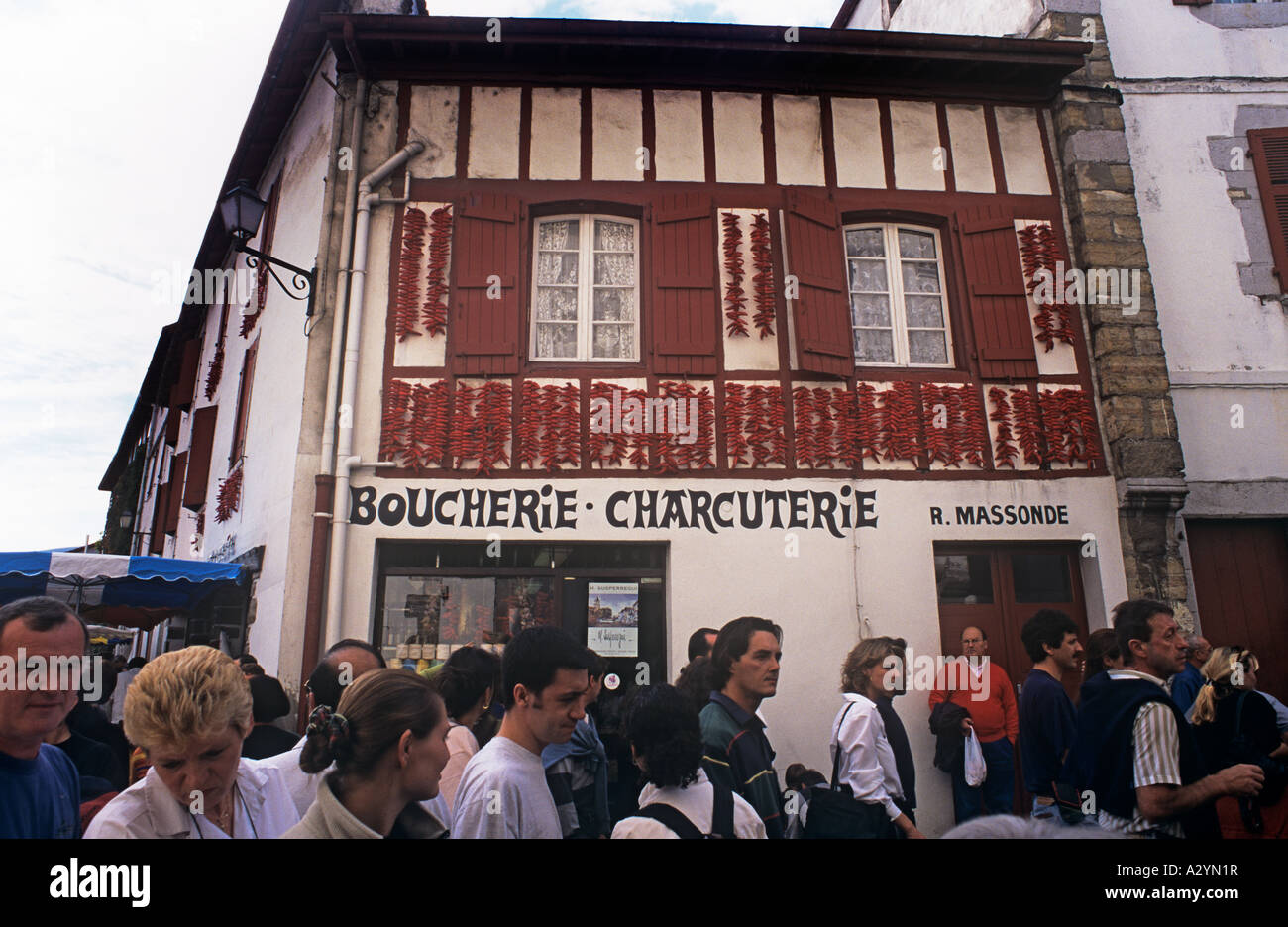In the Basque Pyrenees Espelette village is famous for its pimentoes ...
