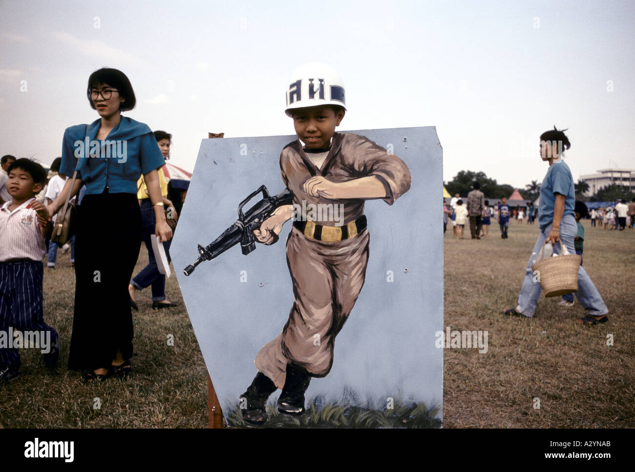 Young boy pretending to be an army soldier on 'kids day', when the army ...