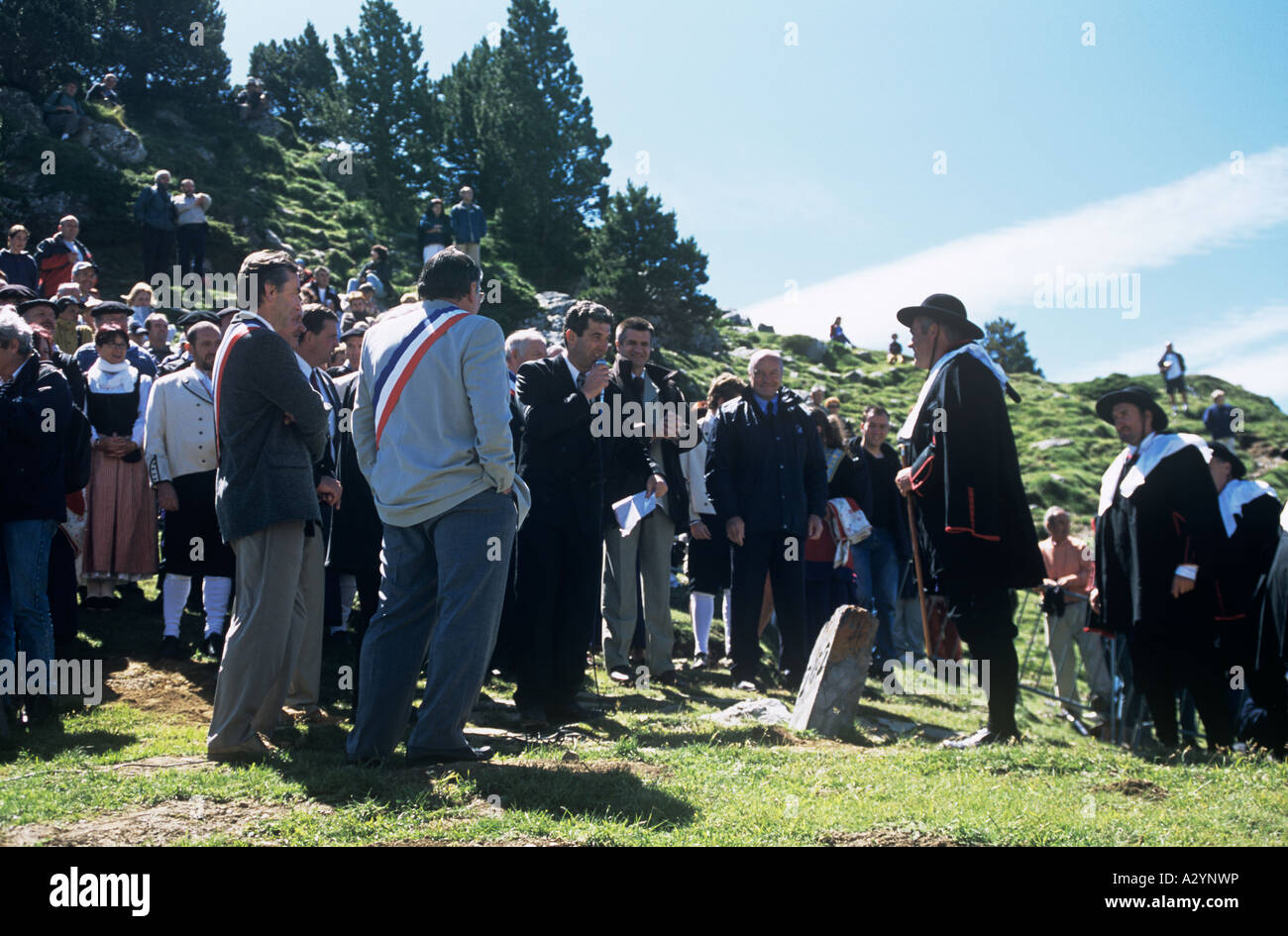 Annual meeting of Spanish and French mayors at a Pyrenees border stone ...