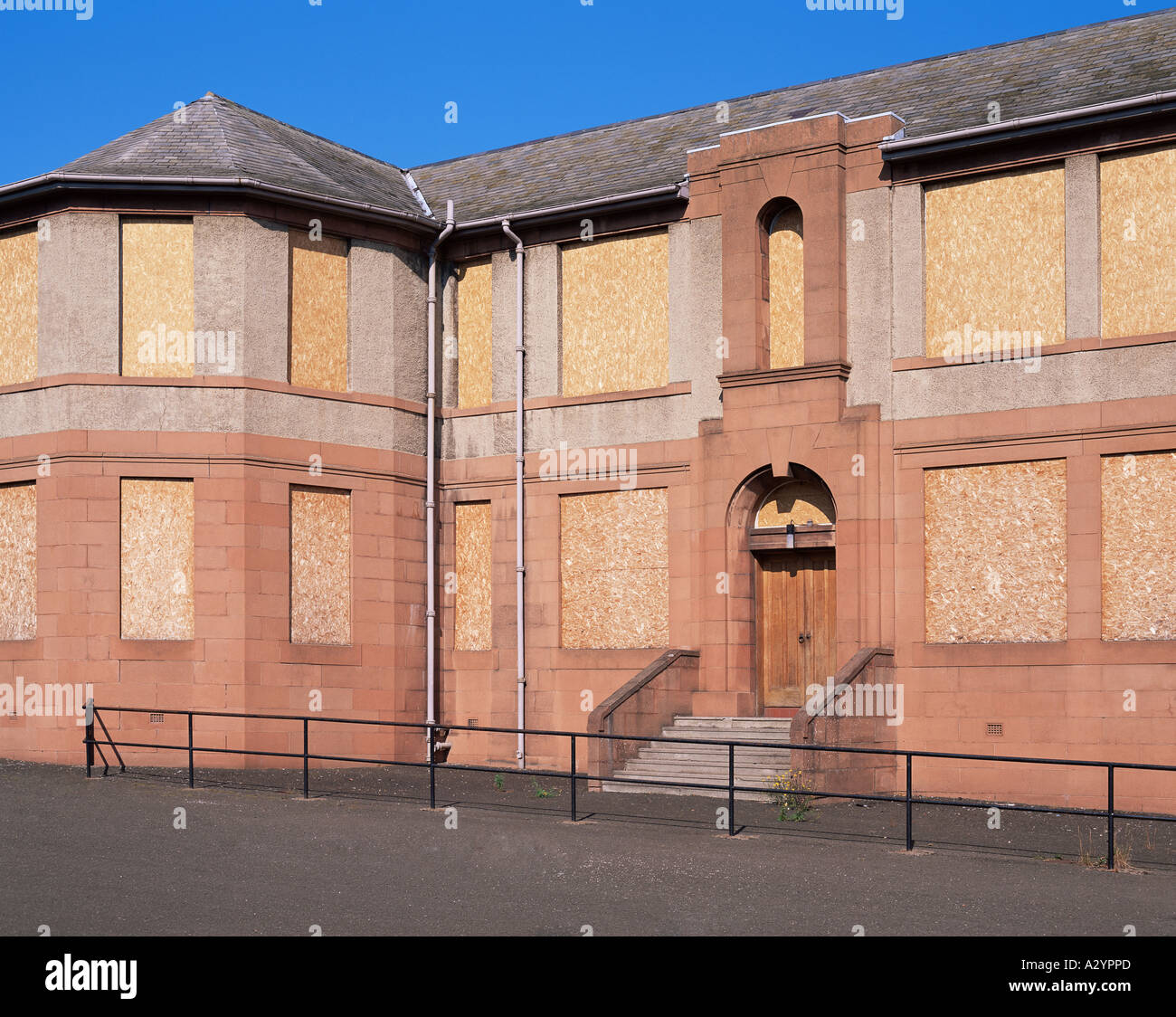 Pink brick building Stock Photo - Alamy