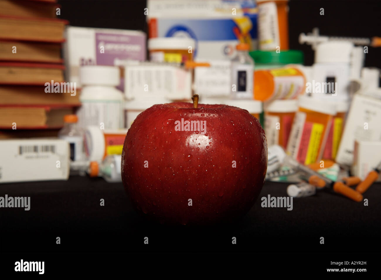 fruit apple book drug medicine Stock Photo - Alamy