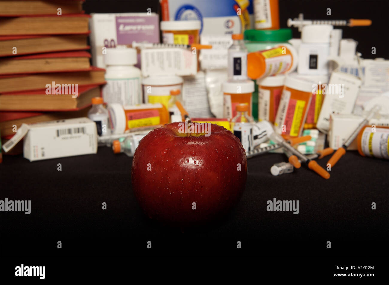 fruit apple book drug medicine Stock Photo - Alamy