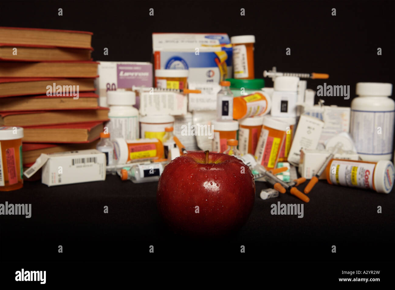 fruit apple book drug medicine Stock Photo - Alamy