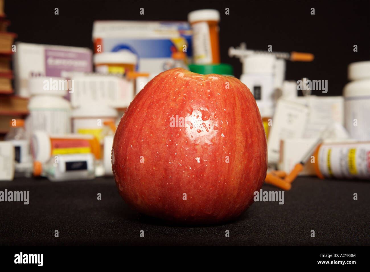 fruit apple book drug medicine Stock Photo - Alamy