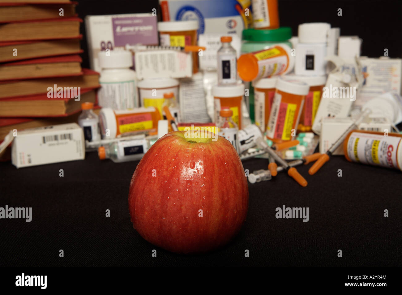 fruit apple book drug medicine Stock Photo - Alamy
