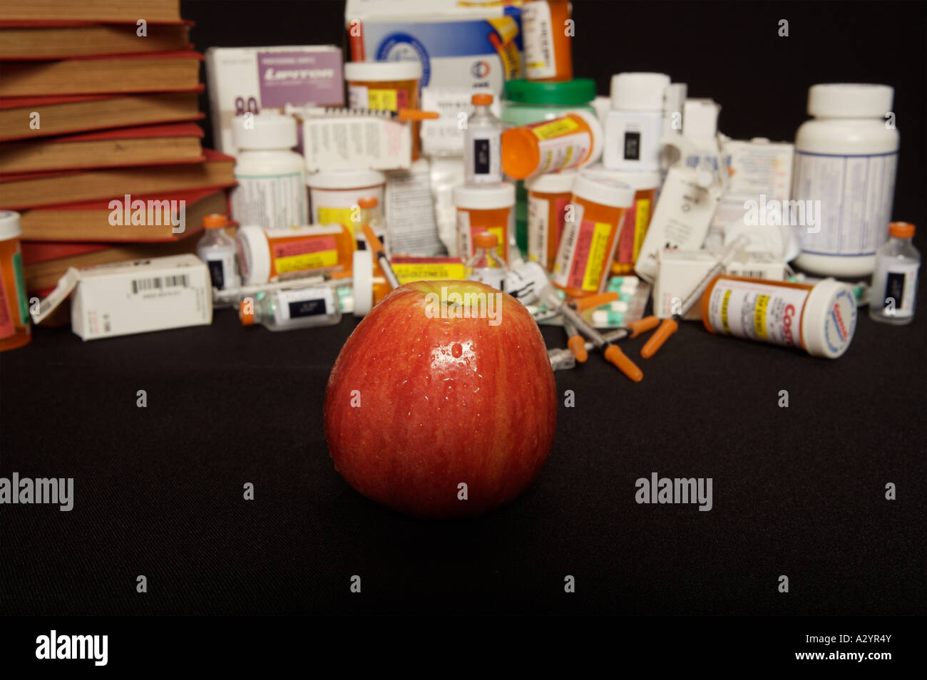 fruit apple book drug medicine Stock Photo - Alamy