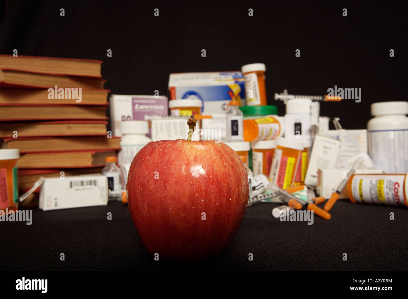fruit apple book drug medicine Stock Photo - Alamy