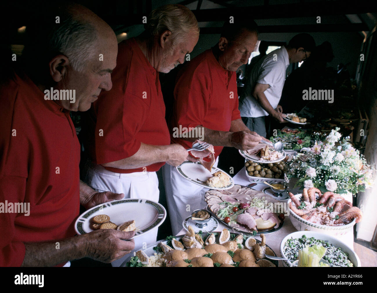 Man buffet eating food spread hi-res stock photography and images - Alamy