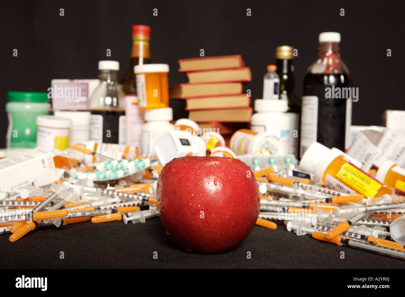 fruit apple book drug medicine Stock Photo - Alamy