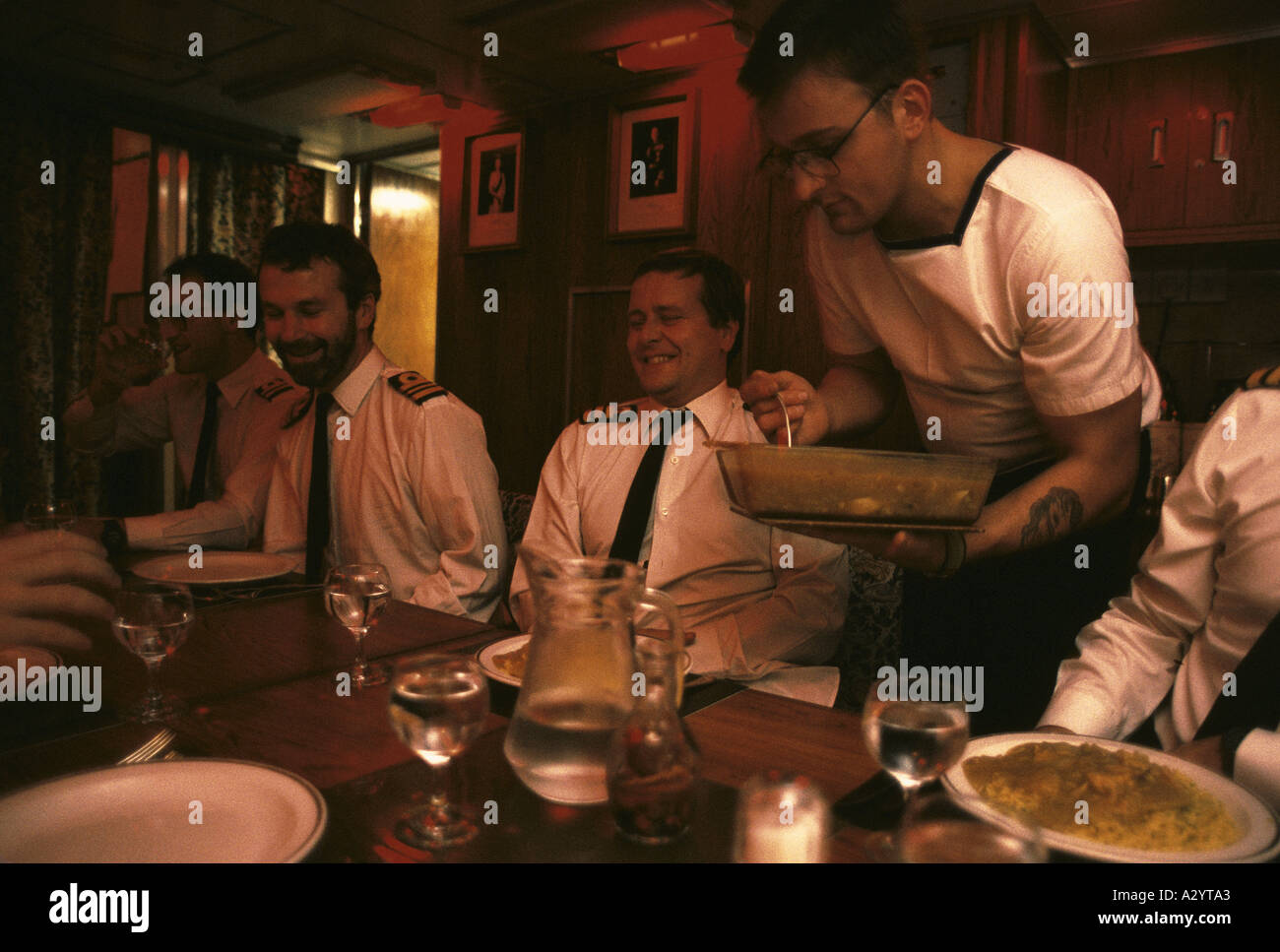crew serving dinner in the officers mess on a submarine Stock Photo - Alamy