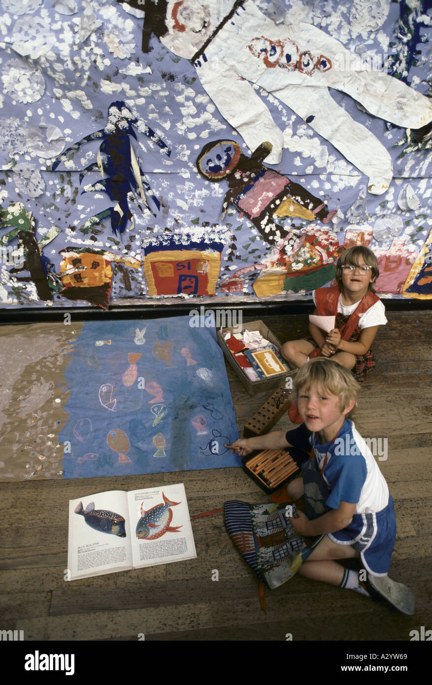 two children in a primary school art class Stock Photo - Alamy