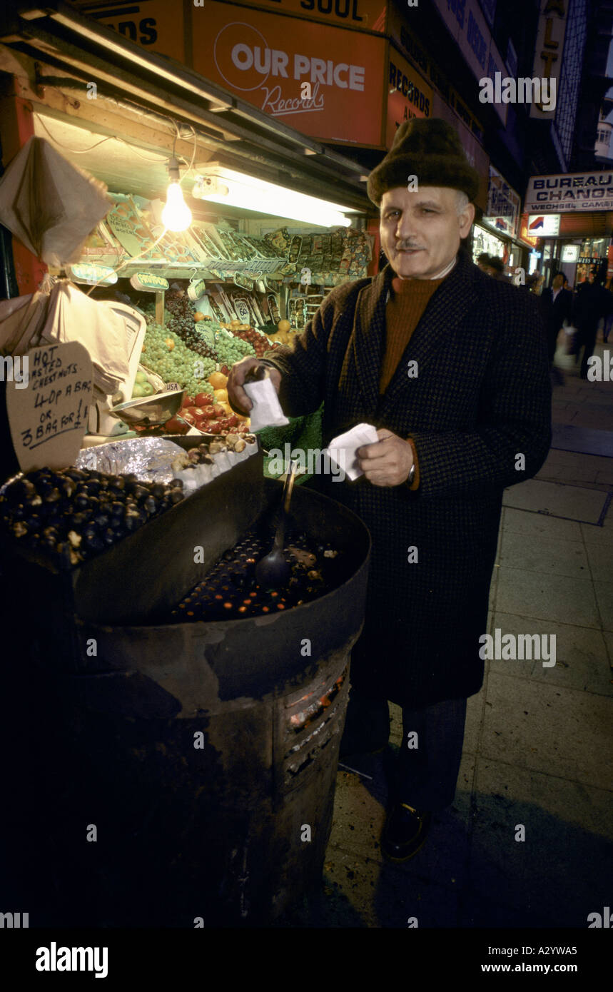 roast chestnut stall in london market Stock Photo - Alamy