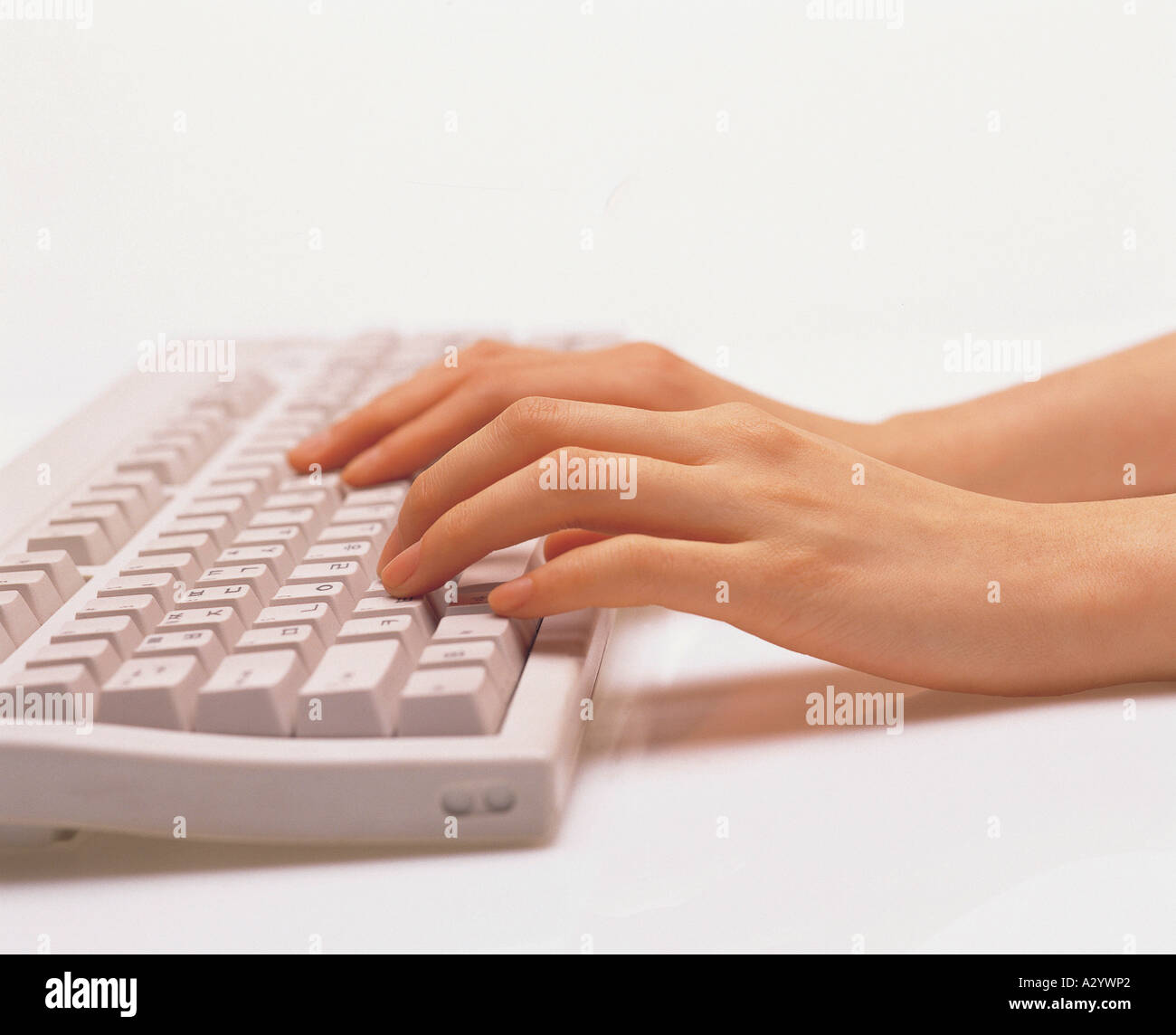 two hands typing keyboards Stock Photo - Alamy