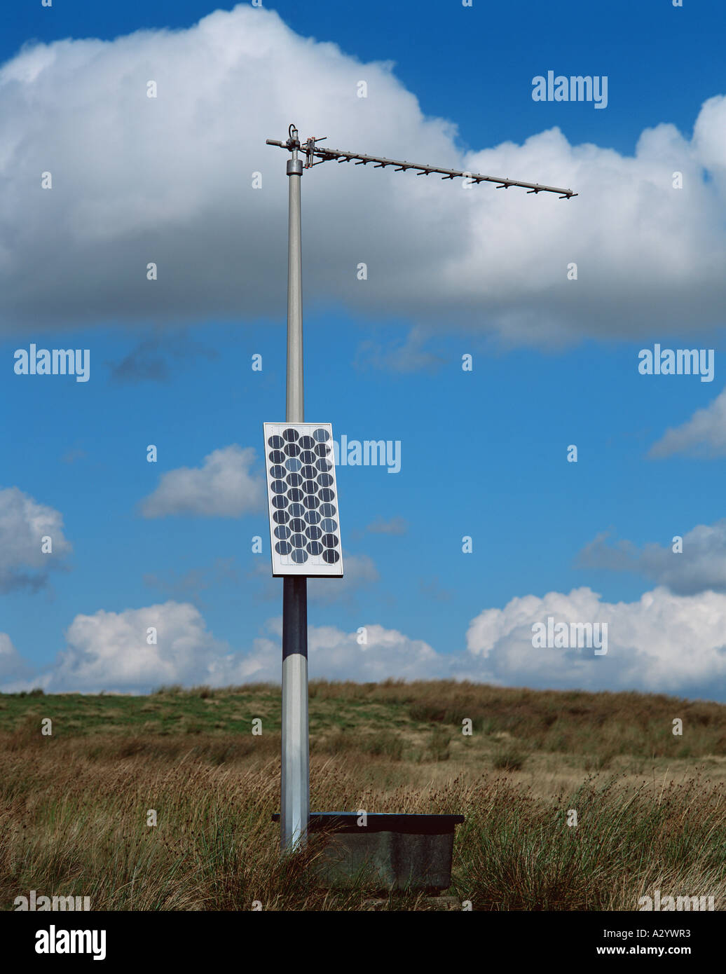 Solar panel on antenna pole in field Stock Photo - Alamy