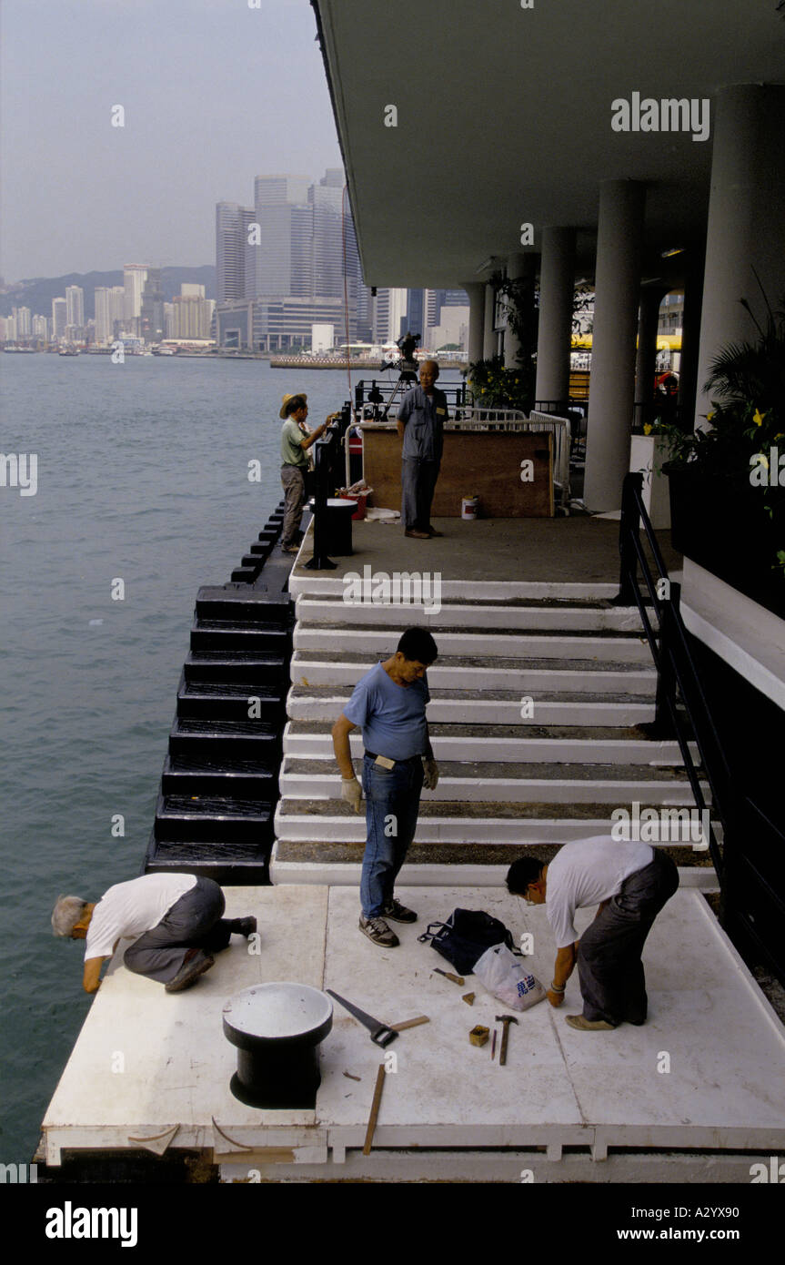 carpenters building steps for the arrival of chris patten as governor ...