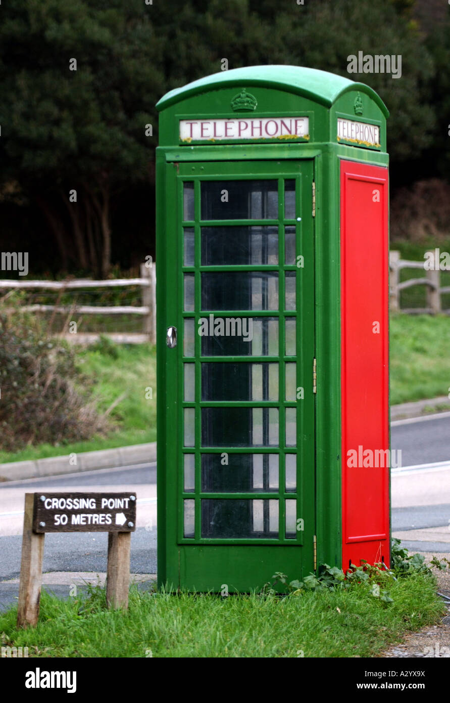 Green painted telephone box hi-res stock photography and images - Alamy