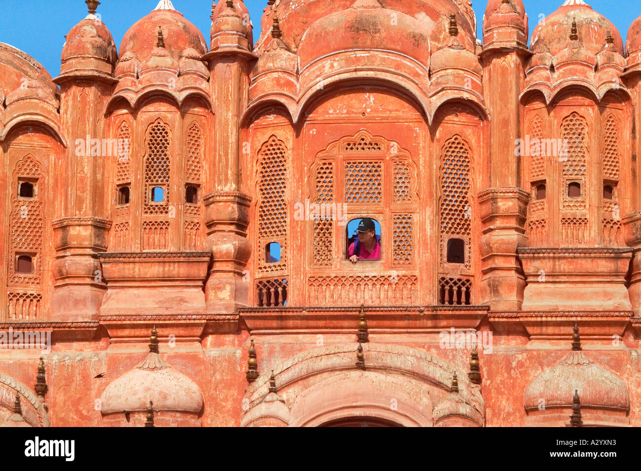 Tourist by the window of Hawa Mahal Palace of Winds Jaipur Rajasthan ...