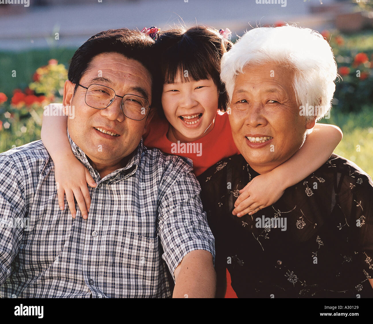 Chinese grandparents and their granddaughter Stock Photo - Alamy