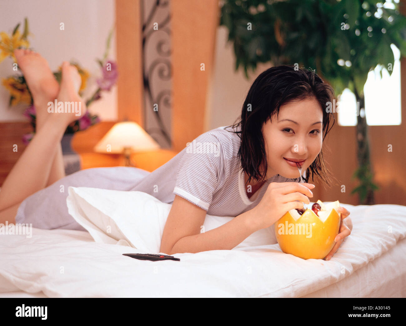 Chinese woman lay bed hi-res stock photography and images - Alamy
