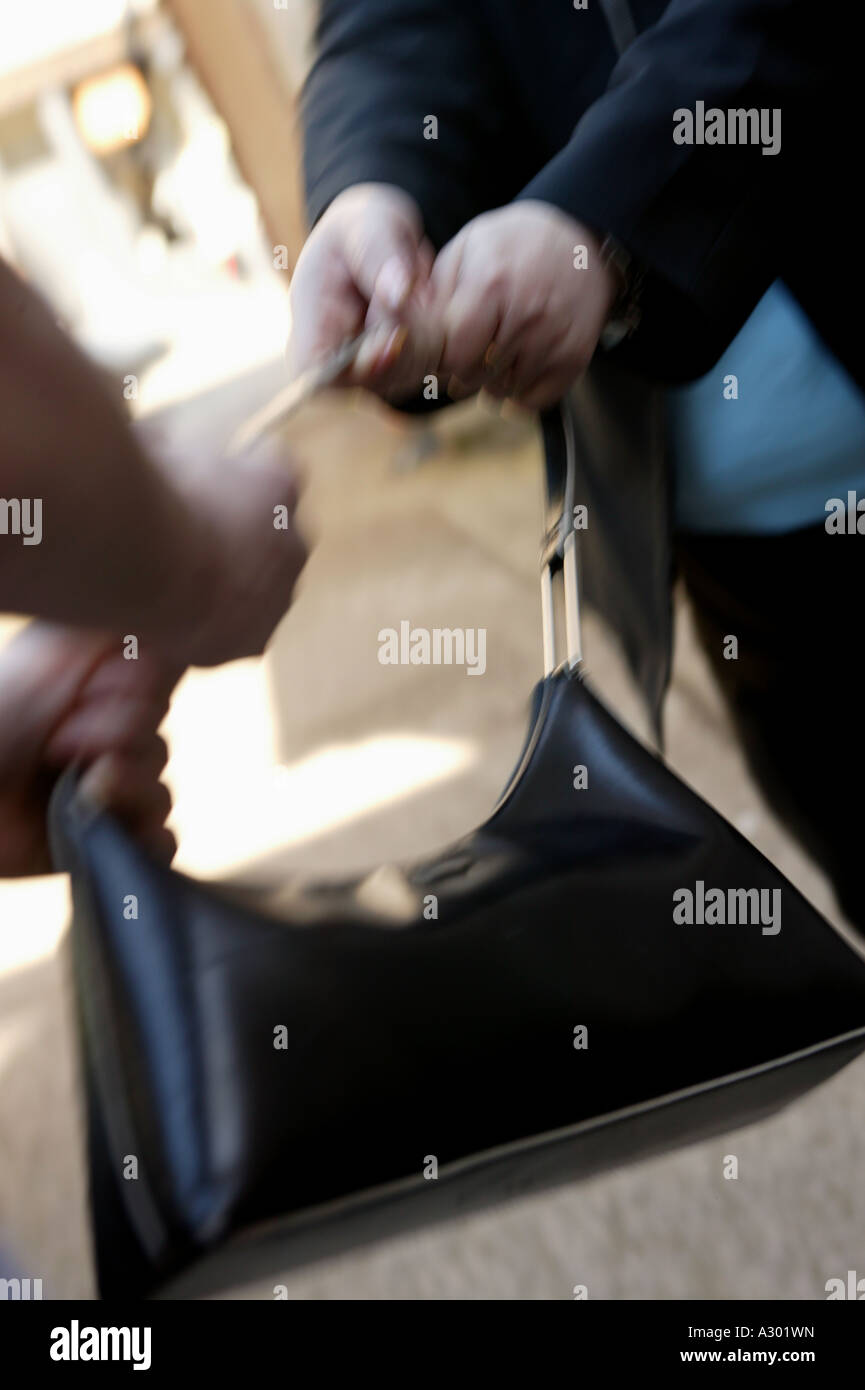 Bag snatching hi-res stock photography and images - Alamy