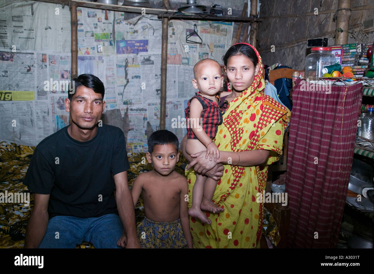 Portrait of a rickshaw driver and his family in Dhaka Stock Photo - Alamy