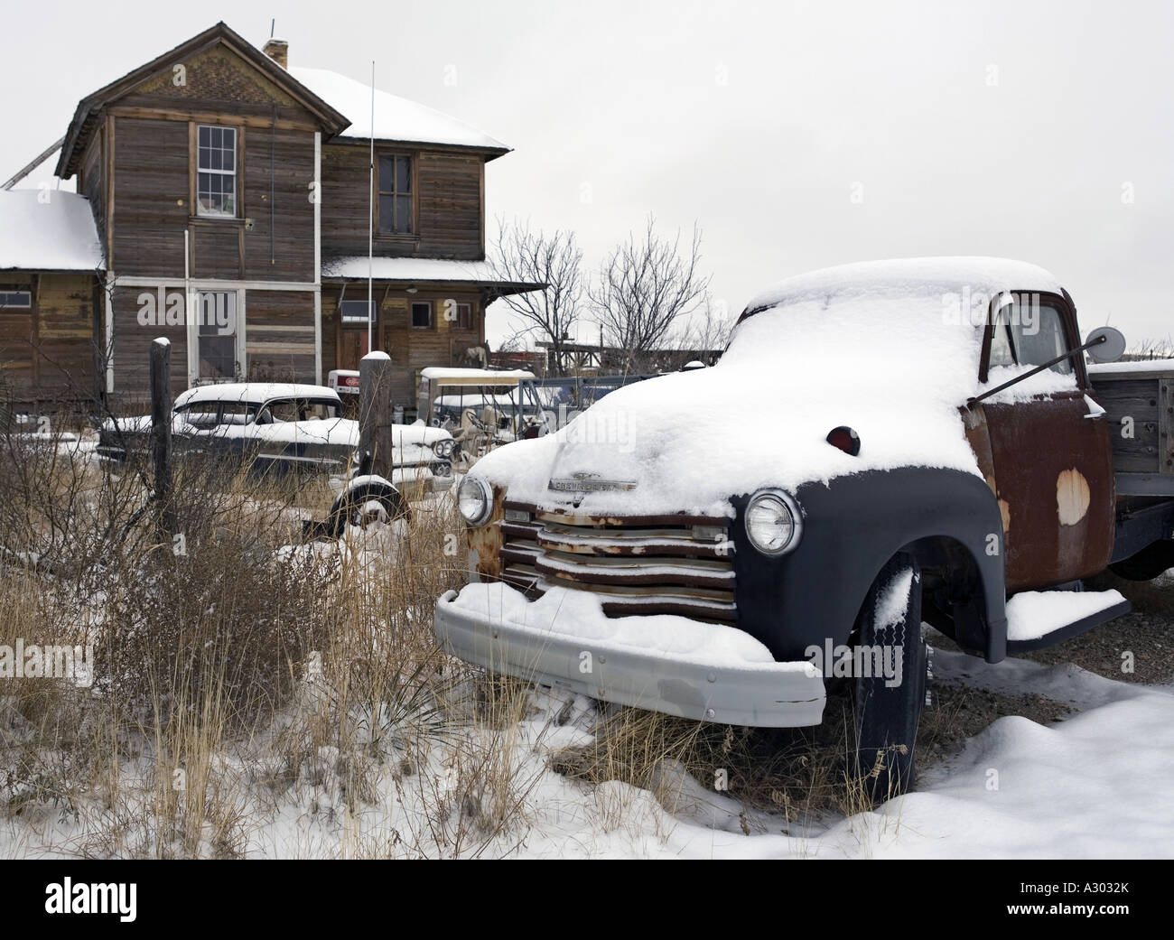 Old and disabled cars in front of the Marathon old railroad depot Texas ...