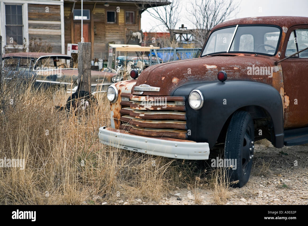 Old and disabled cars in front of the Marathon old railroad depot Texas ...