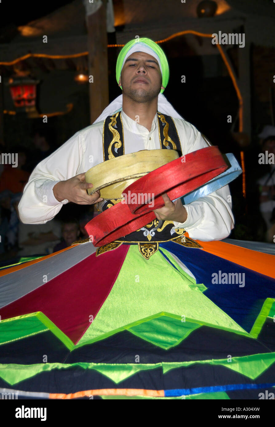 Egyptian dancer in the style of a whirling dervish performing in north ...