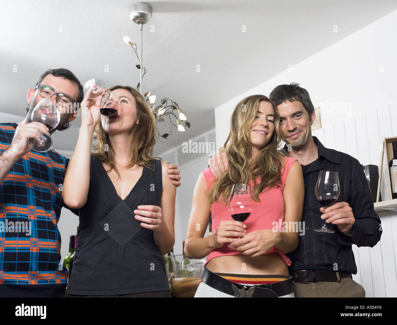 Group of friends at wine tasting Stock Photo - Alamy