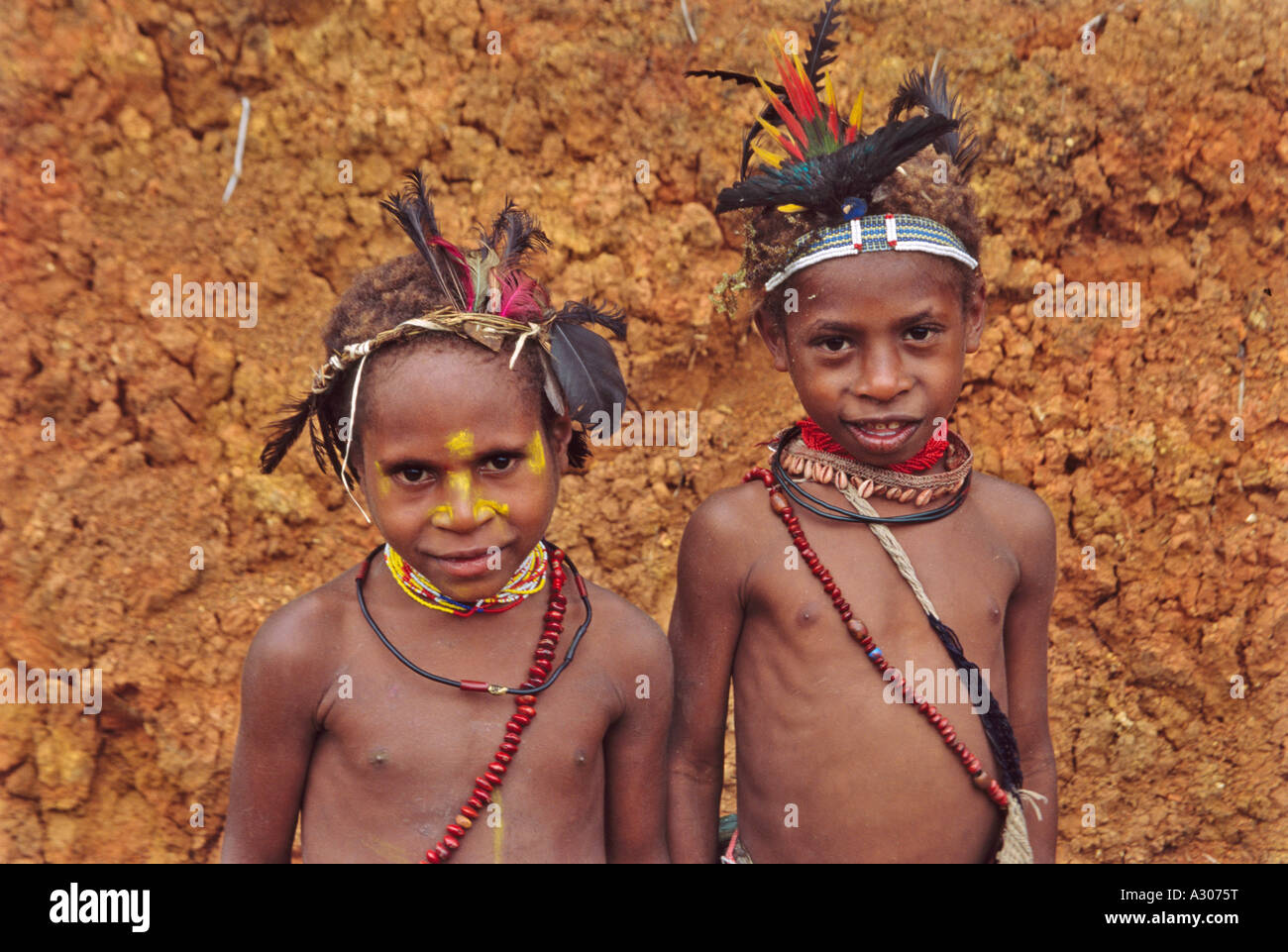 Two Huli girls standing by the wall Tari Southern Highlands Papua New ...
