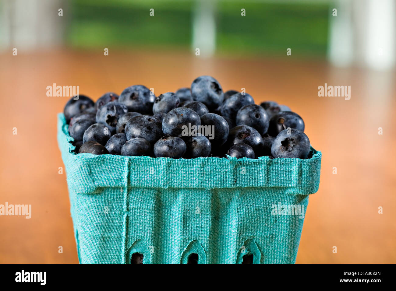 Blueberries on green table hi-res stock photography and images - Alamy
