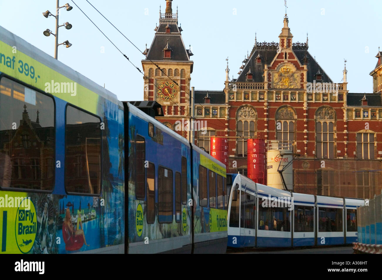 Bus passes by Central station Amsterdam Netherlands Stock Photo - Alamy