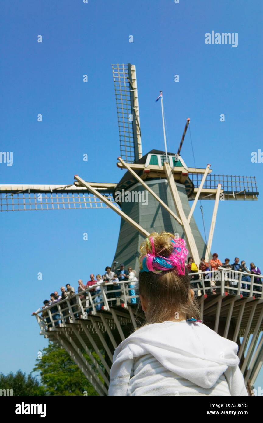 Little girl with windmill in Keukenhof Gardens Amsterdam Netherlands ...