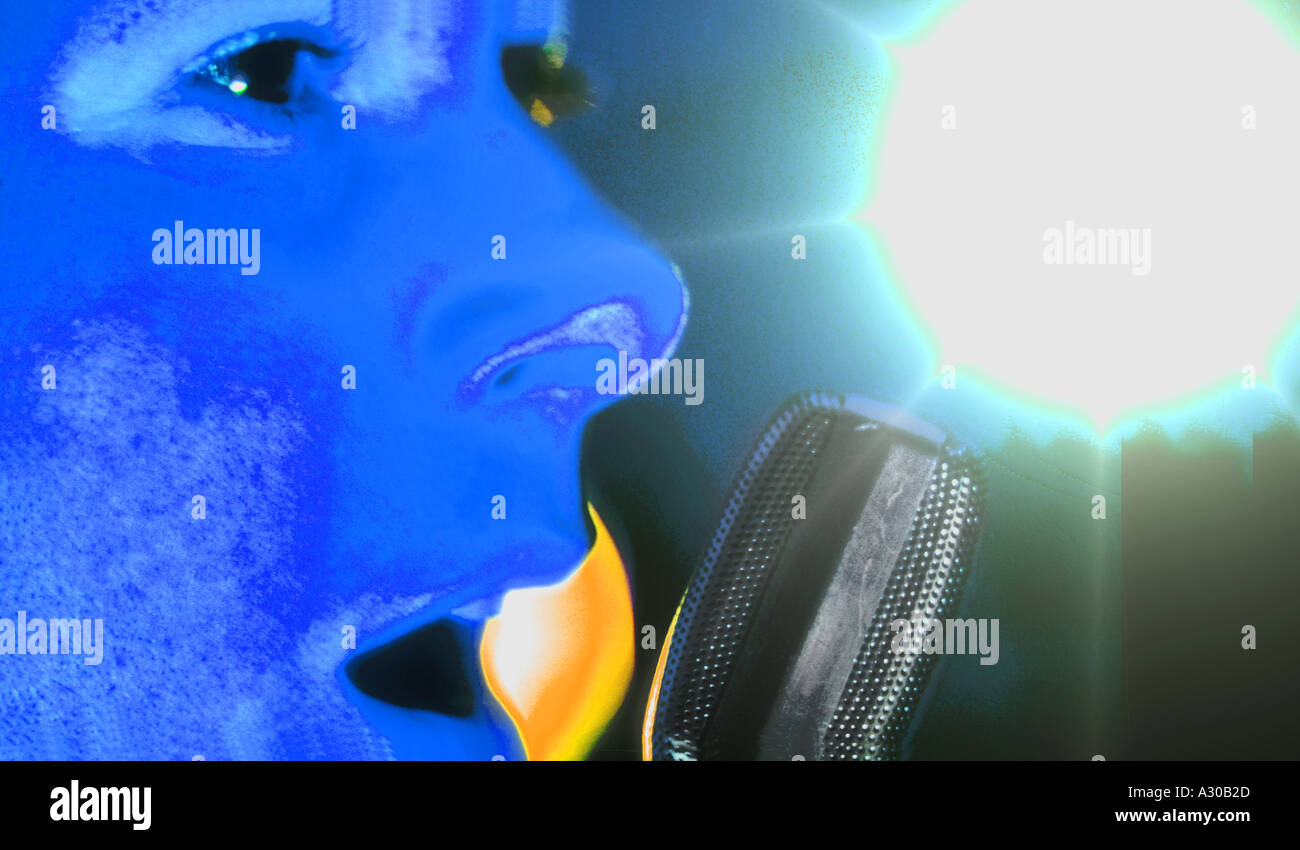 Singer with microphone Stock Photo - Alamy