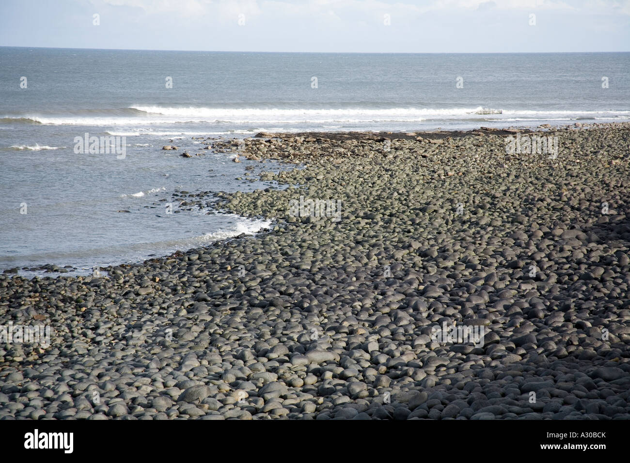 Dunstanburgh castle beach Northumberland England Stock Photo - Alamy