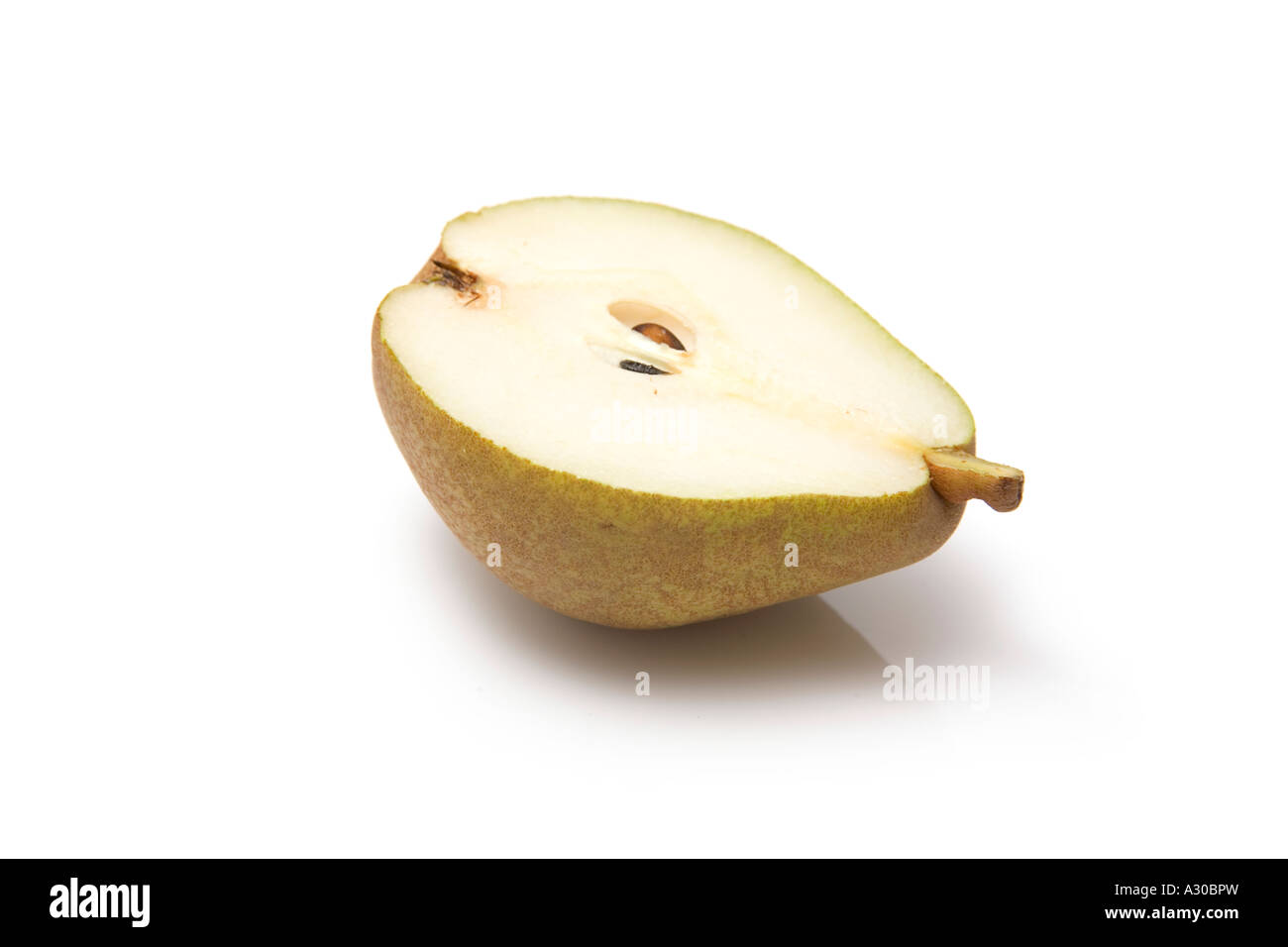 Pear halved and isolated on a white studio background Stock Photo - Alamy