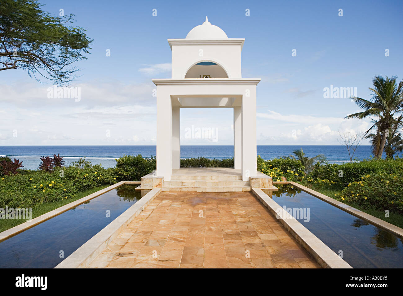 White building by ocean Stock Photo - Alamy