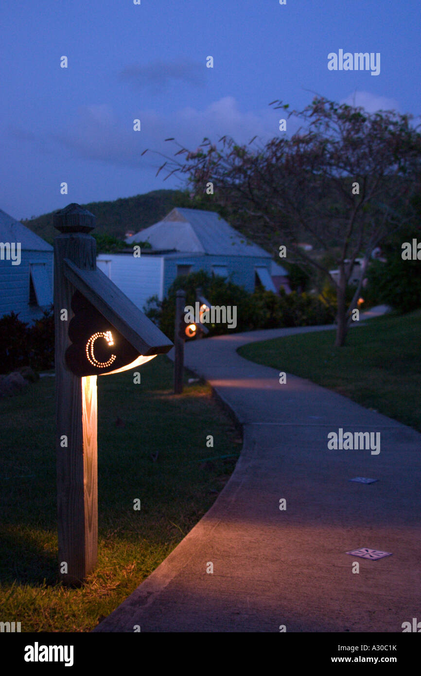 A lamp-lit winding path through the Coco Bay resort in Antigua Stock ...