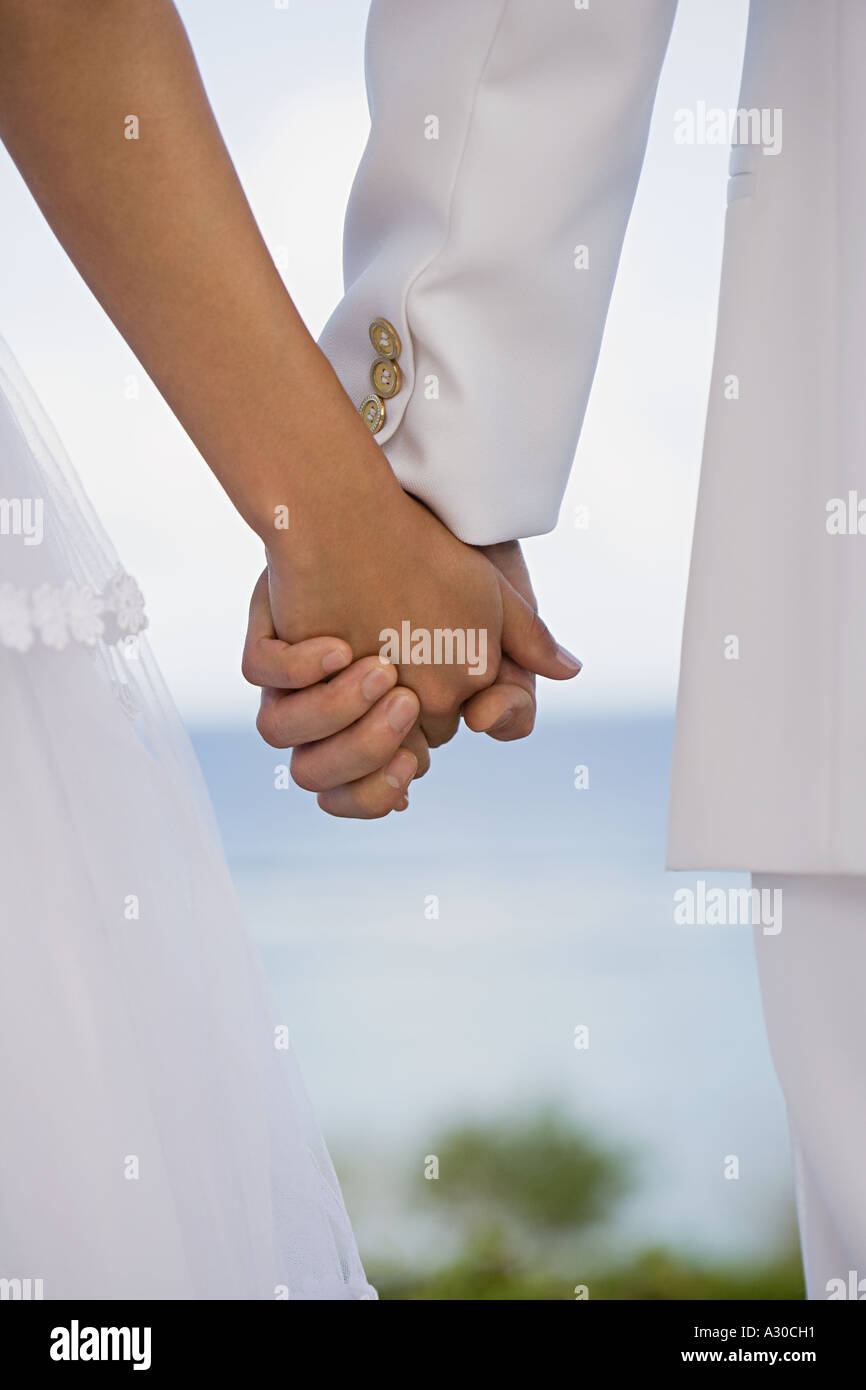 Beautiful young wedding couple stands hi-res stock photography and ...