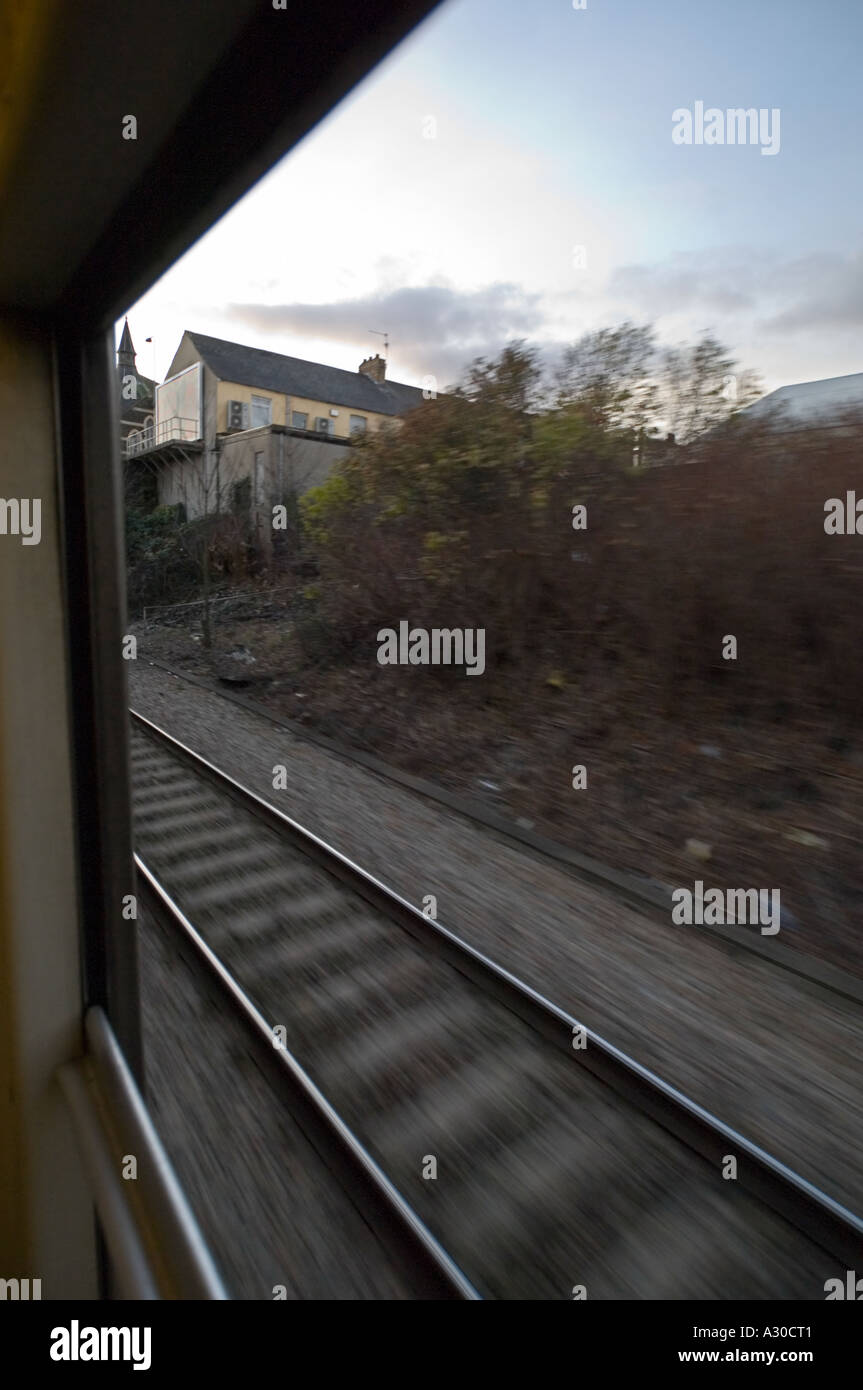 Rail tracks as seen from the window of a moving train Stock Photo - Alamy