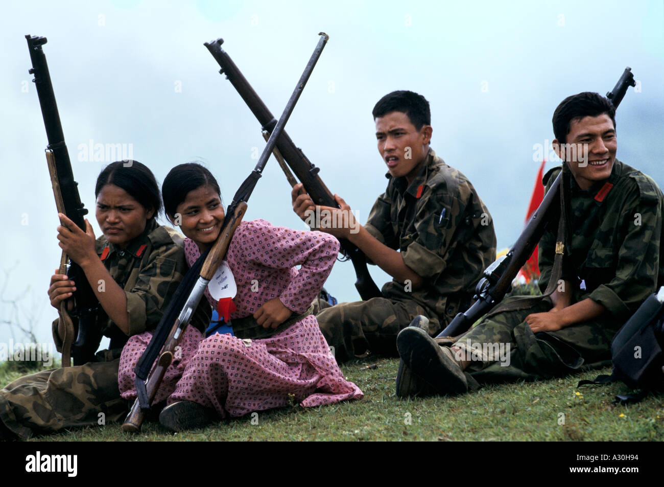 Maoist guerillas equipped with old rifles (captured from Nepali Police ...