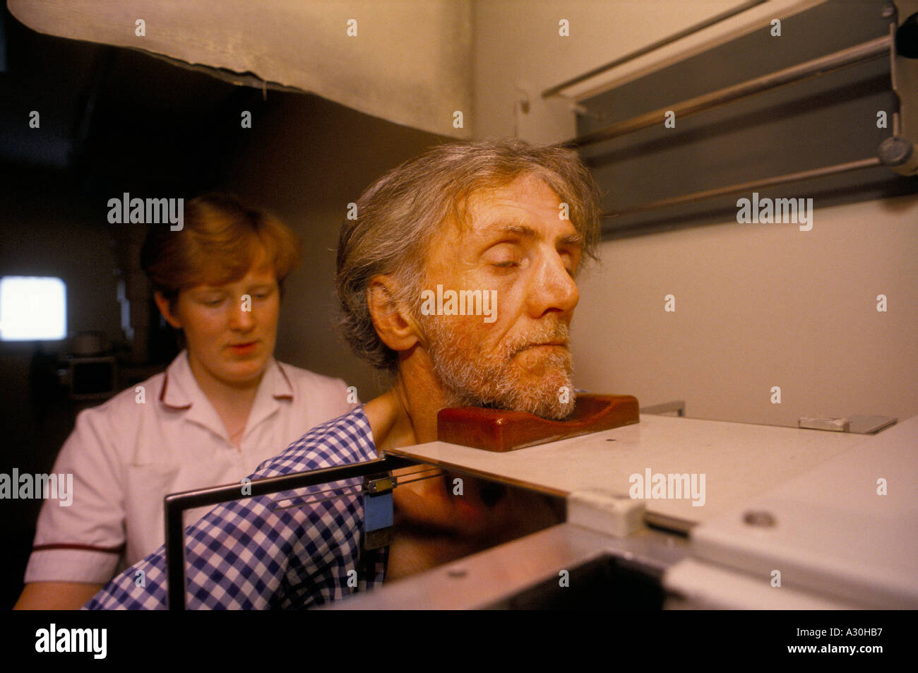 A homeless man with tuberculosis is given an x ray by a nurse at ...