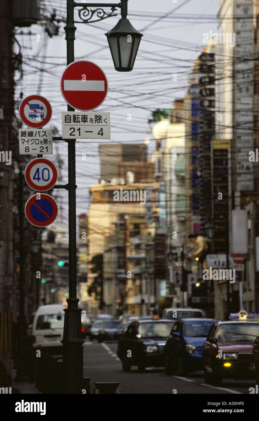 Traffic signs and cars in a street in Kyoto Japan Stock Photo - Alamy