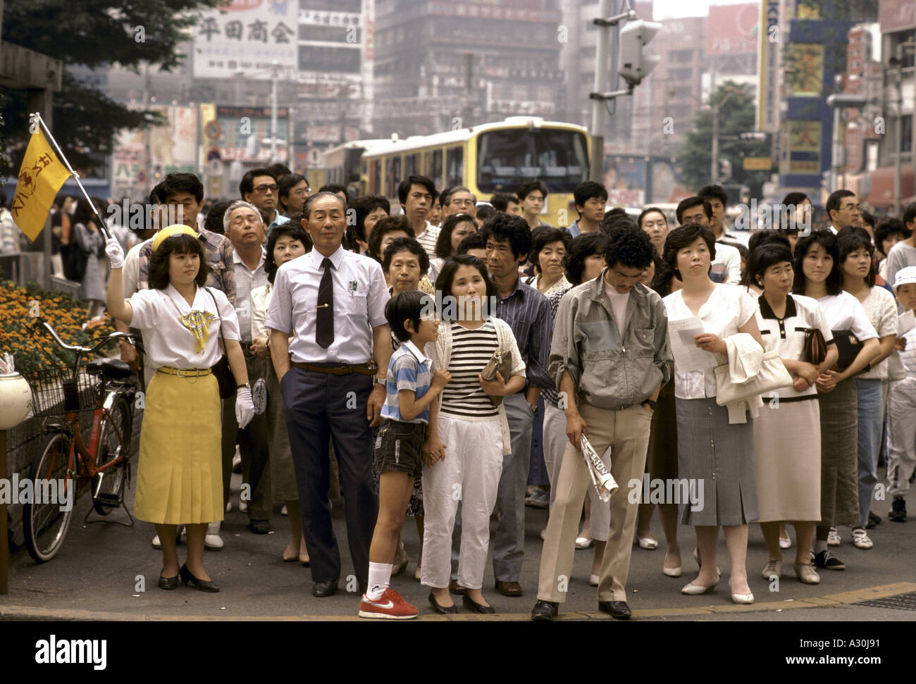 tokyo japan a party of out of towners waiting with their guide for the ...
